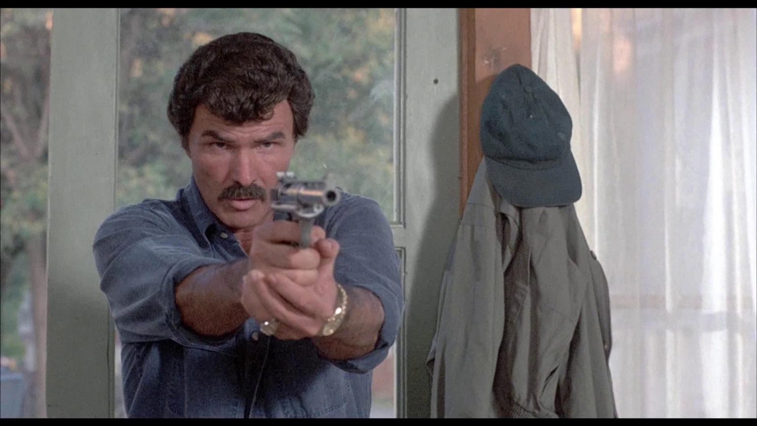 Malone (1987): Burt Reynolds in Flannel—The Action Thriller Equivalent ...